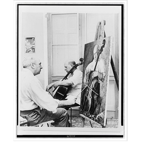 Historic Print, [Pablo Casals, seated, playing cello while being ...