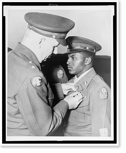 Historic Print, [Pfc. Richard Langley of the 66th transportation truck company receiving the ...