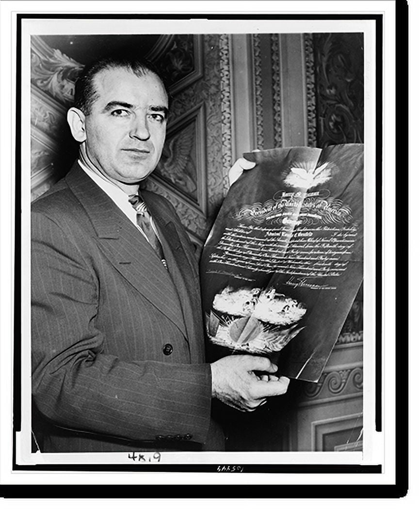Historic Print, [Sen. Joseph R. McCarthy (R-WIS) displays what he says ...
