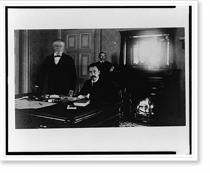 Historic Print, [Three Treasury Department employees in office], 18" x ...