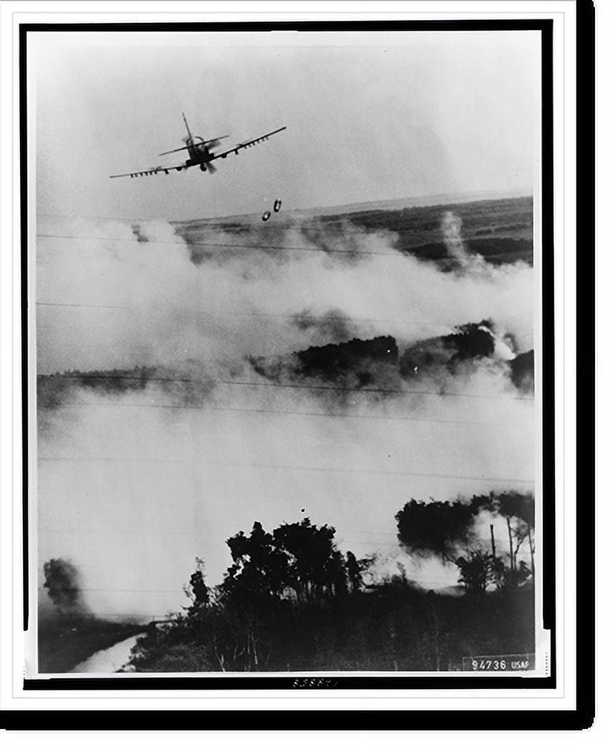 Historic Print, Two bombs tumble from a Vietnamese Air Force A-1E ...