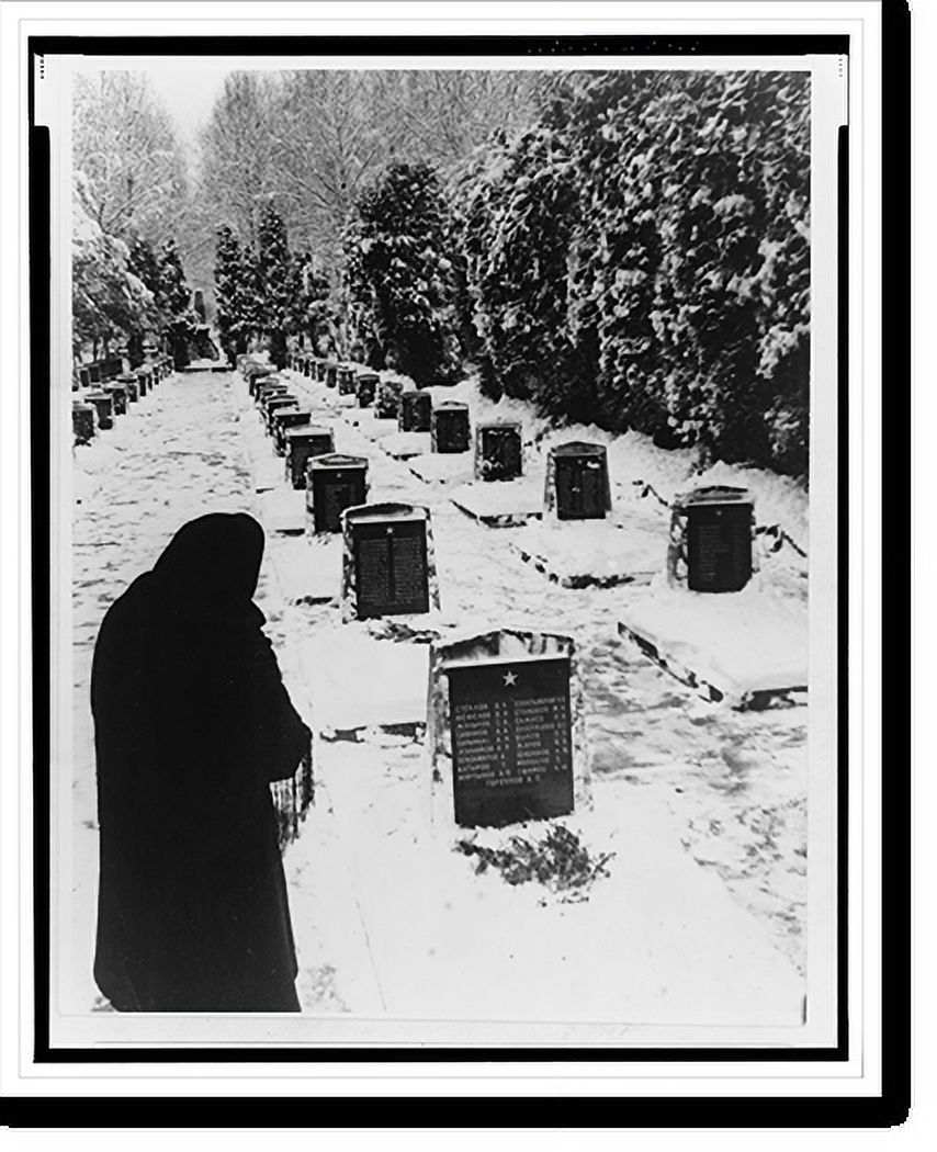 Historic Print, [Woman in snow-covered military(?) cemetery where each ...