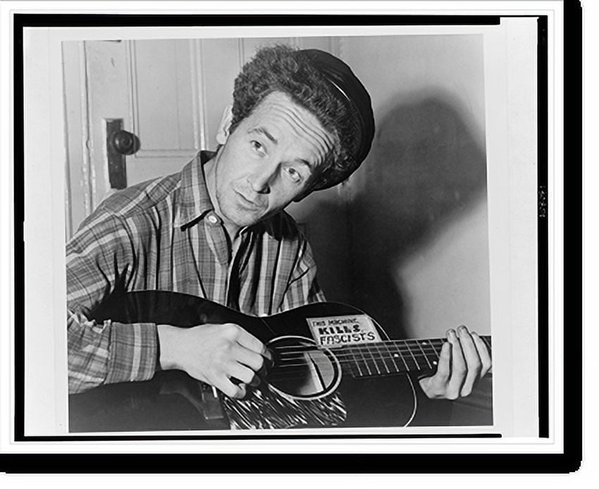 Historic Print, [Woody Guthrie, half-length portrait, seated, facing ...