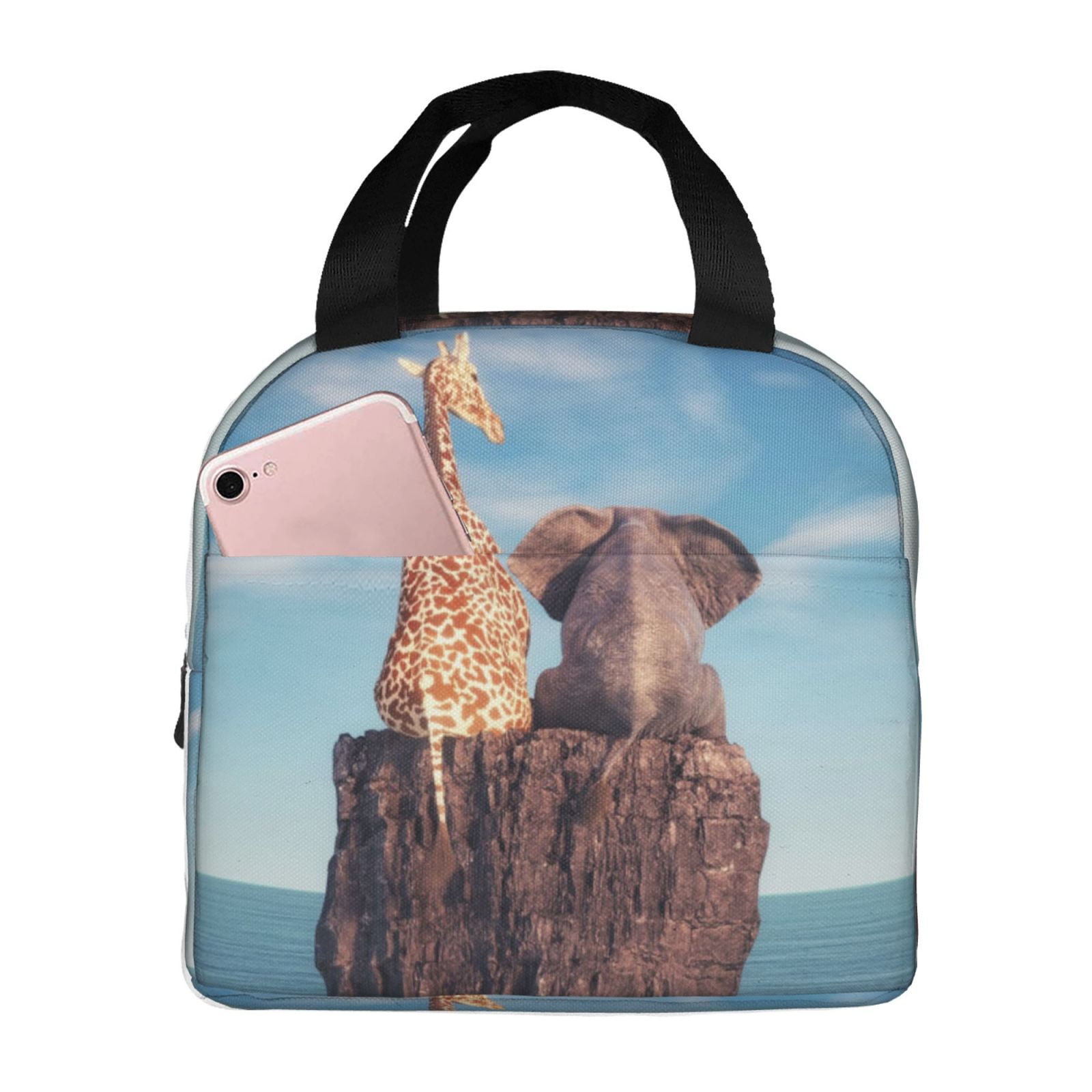 Honeii Elephant And A Giraffe Sitting On A Rock Admiring The Ocean ...