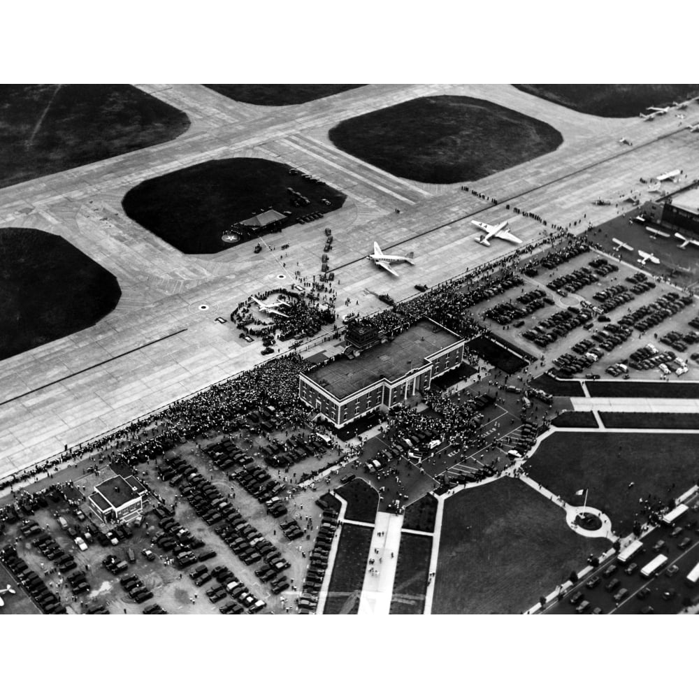 Howard Hughes Lands At Floyd Bennett Airport In His Silver Monoplane ...