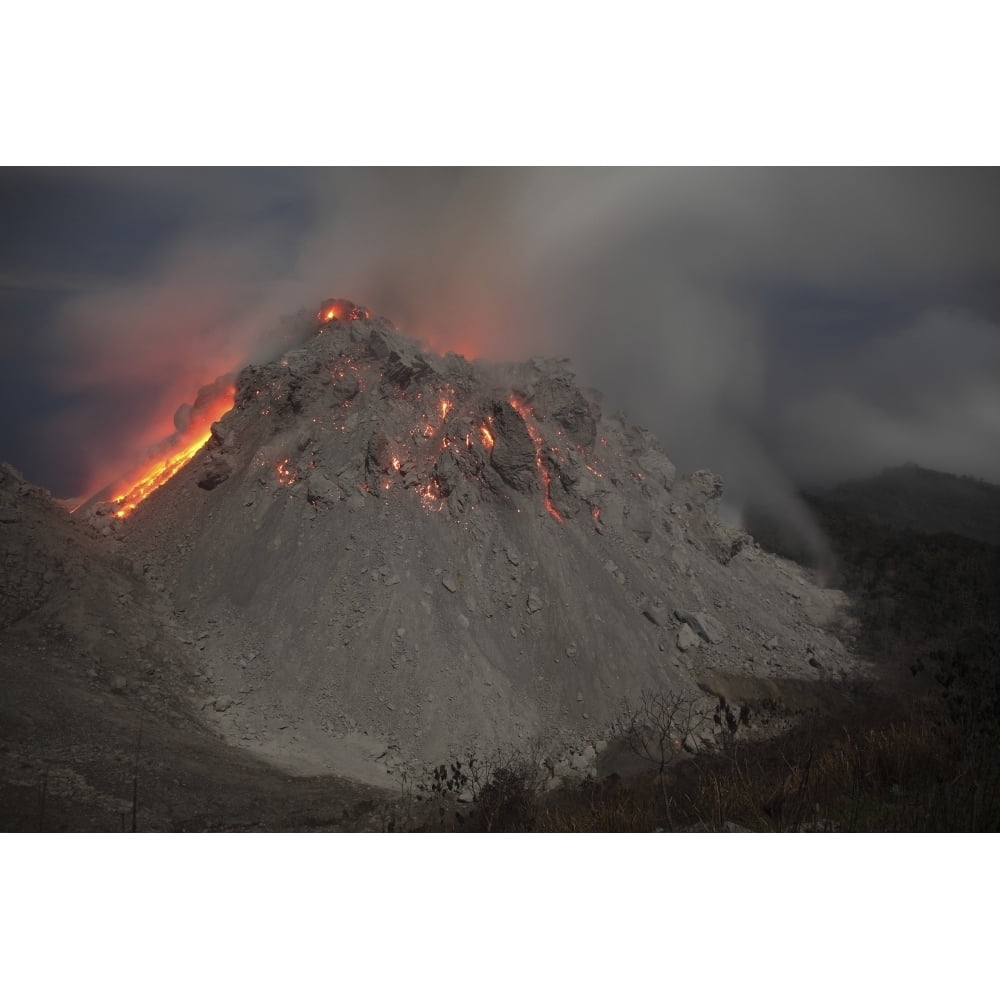 Incandescent rockfall at Rerombola lava dome of Paluweh volcano Poster ...