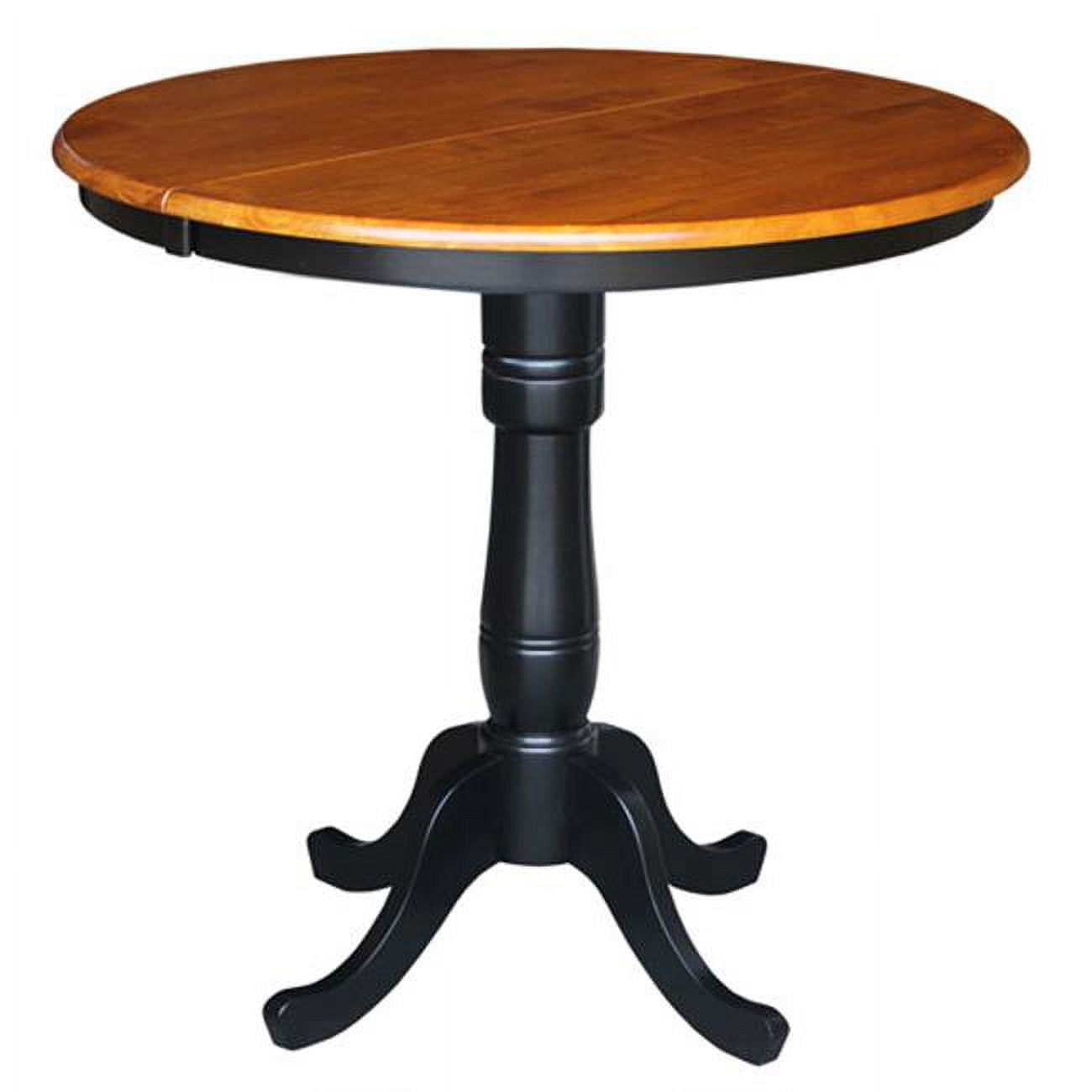 International Concepts 36in. round top ped table with 12in. leaf ...