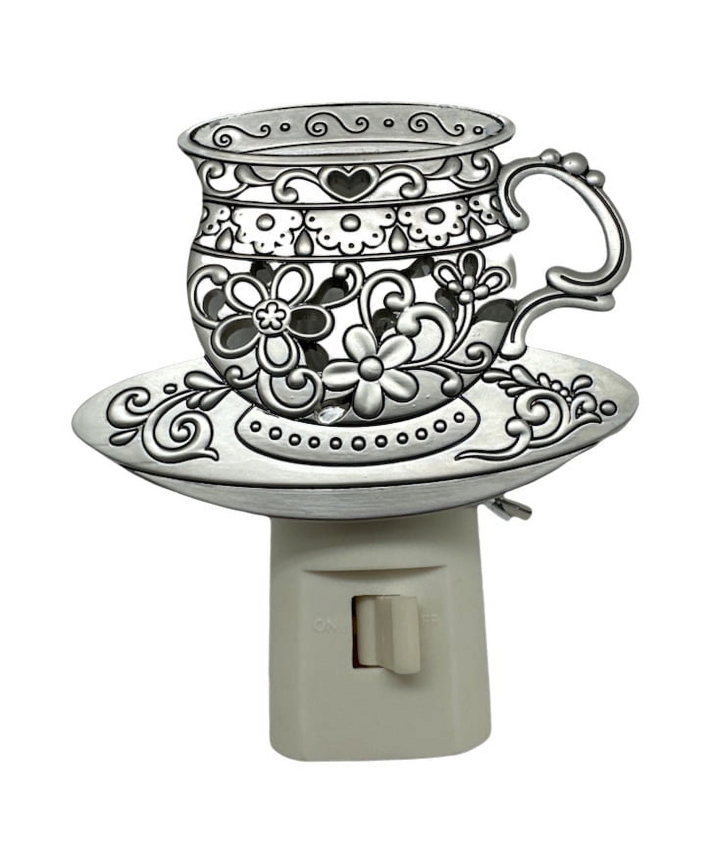 It's Tea Time metal tea cup and saucer with flower and heart engraved ...