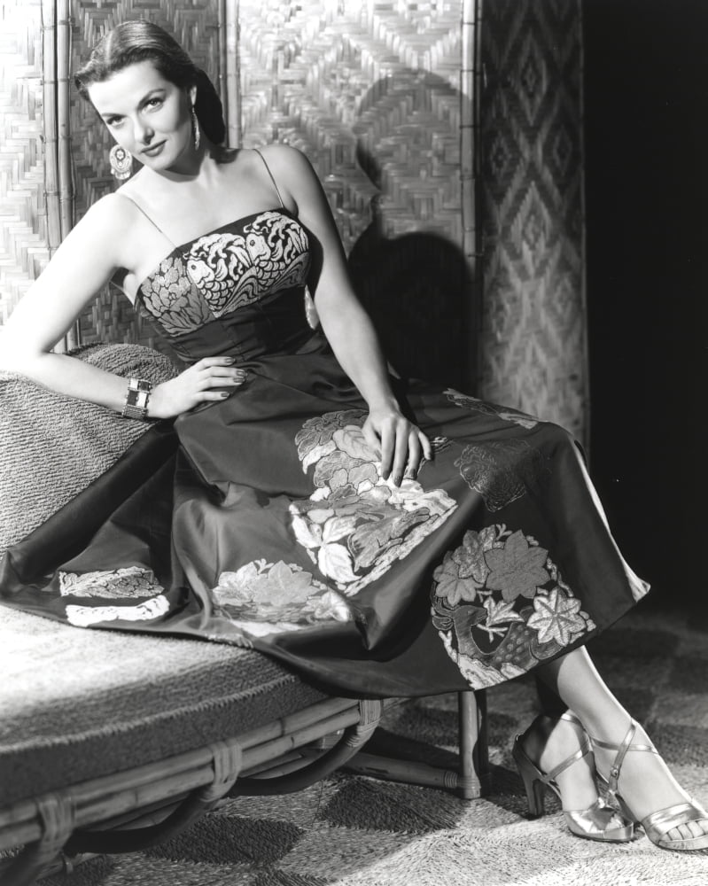 Jane Russell Posed in Silk Floral Strap Dress and Bead Bracelet while ...