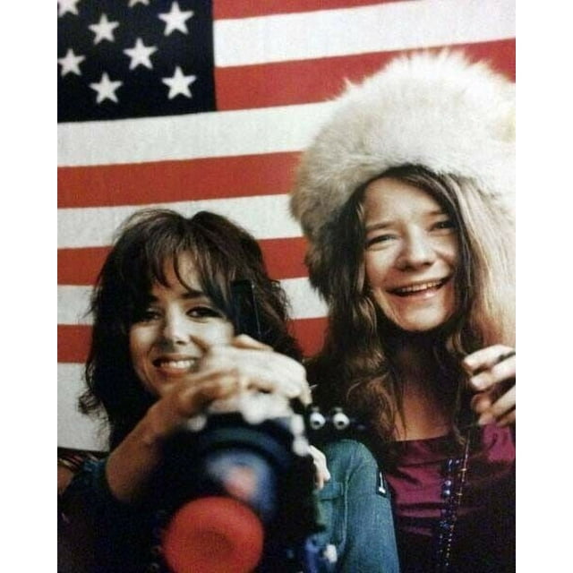 Janis Joplin & Grace Slick circa 1967 smile in front of American flag ...