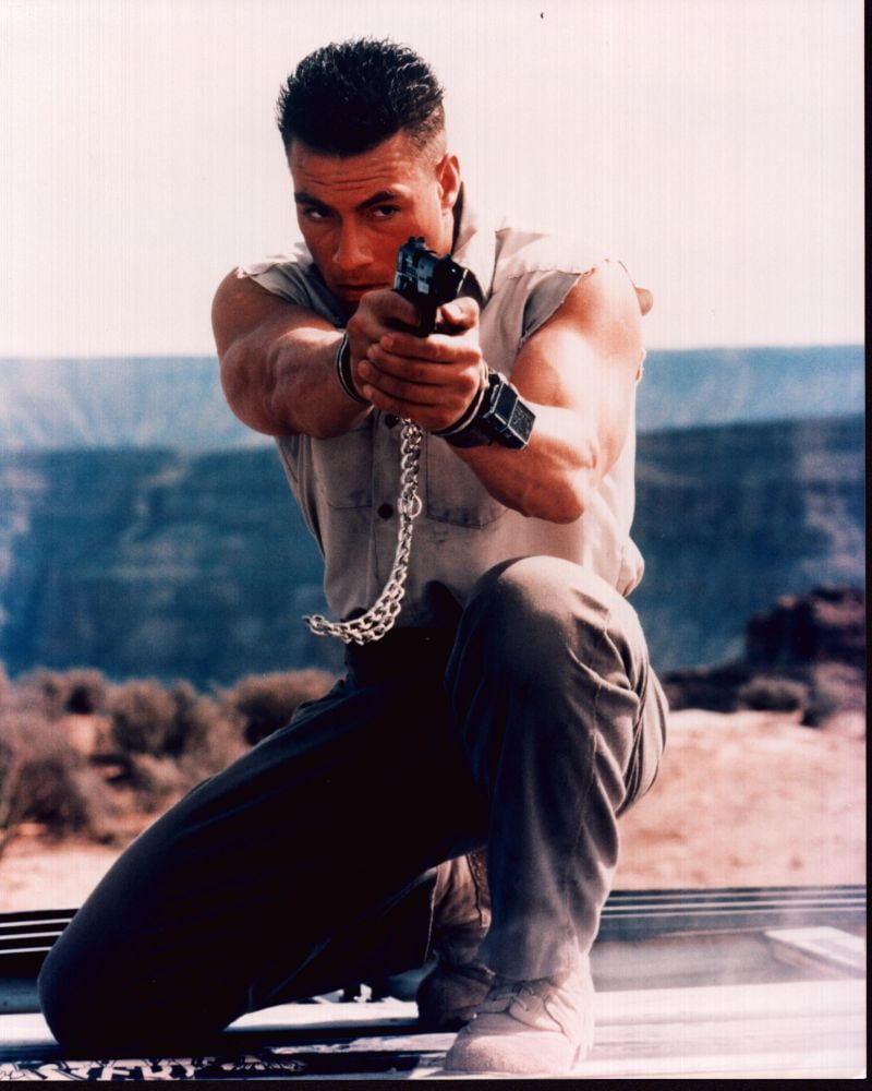Jean-Claude Van Damme In Handcuffs With Gun In Universal Soldier Photo ...