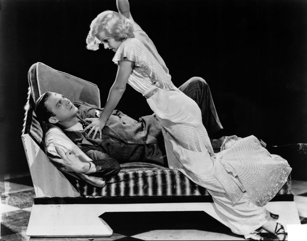 Jean Harlow Scene from a Film Knelt on the Couch in White Ruffled Short ...