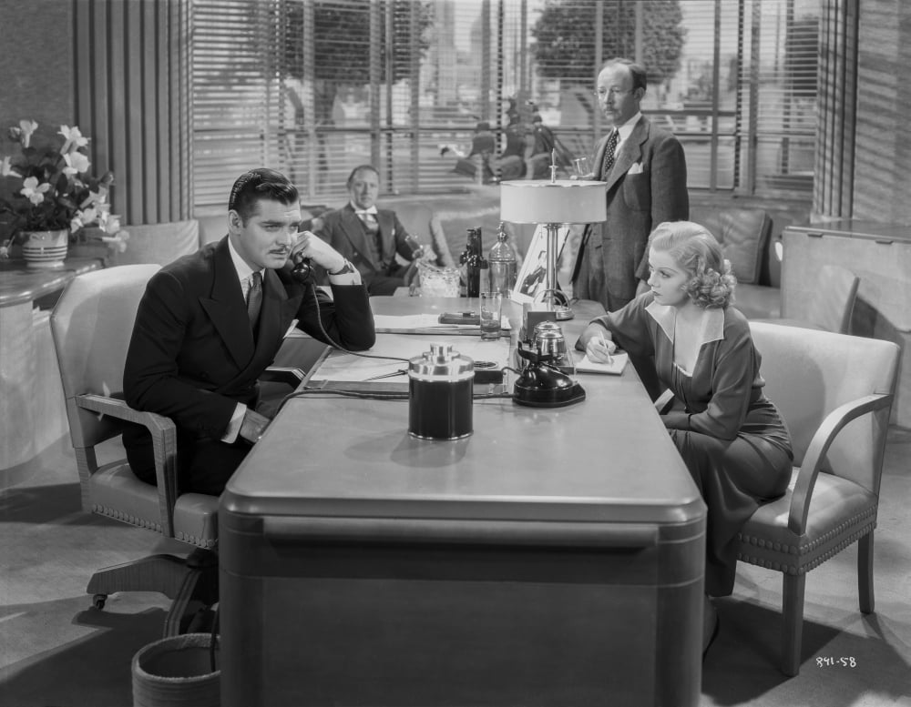 Jean Harlow Scene from a Film sitting In front of the Table in Black ...