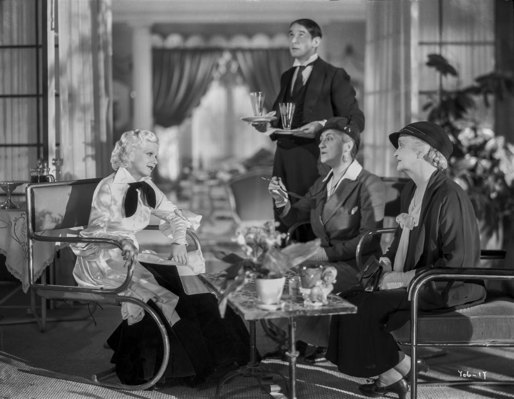 Jean Harlow Scene from a Film sitting on the Chair in White Long Sleeve ...