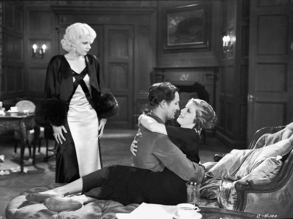 Jean Harlow Scene from a Film standing in Black Long Sleeve Silk Coat ...