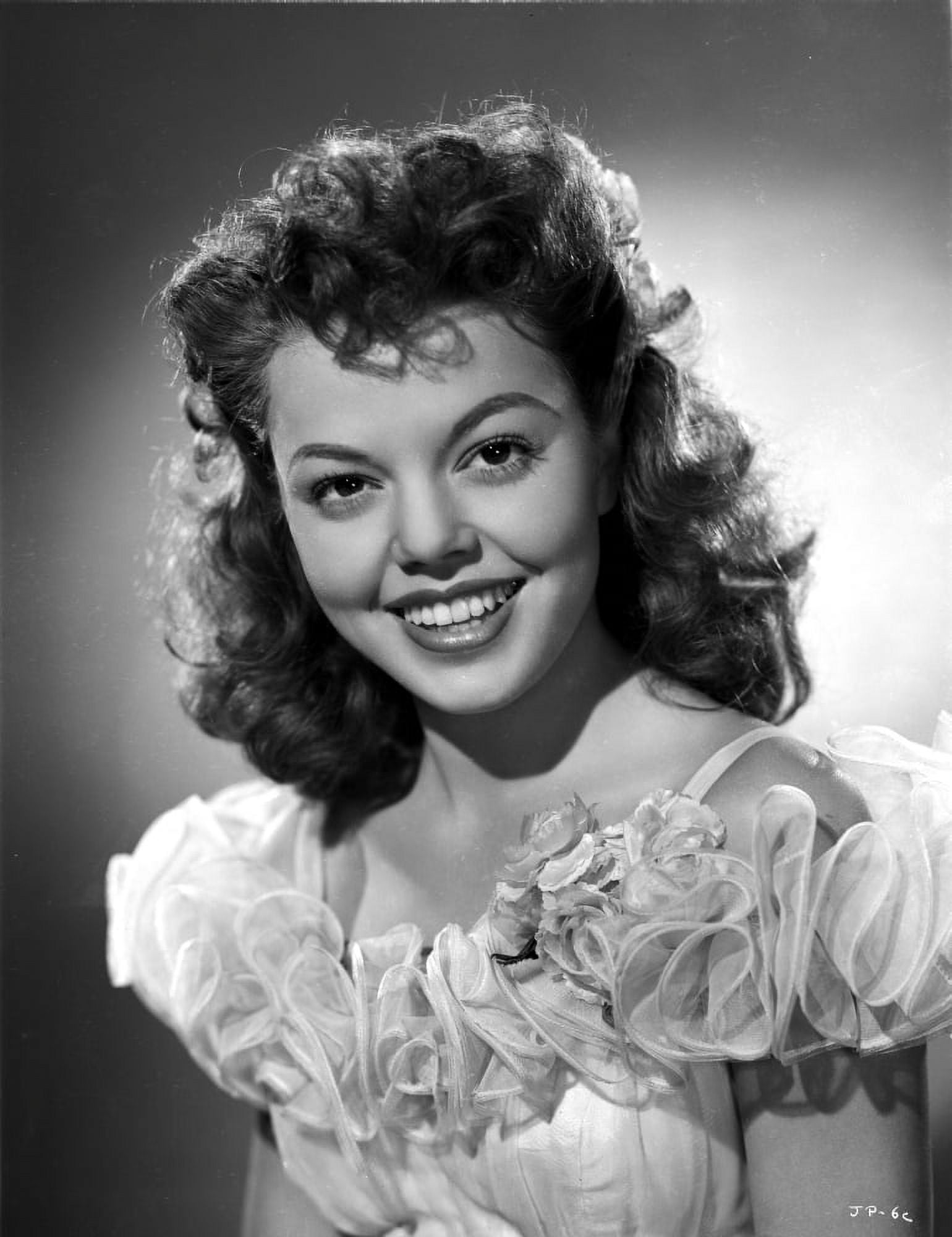 Jean Porter Portrait in Ruffled Sheer Sleeve Off Shoulder Dress Photo ...