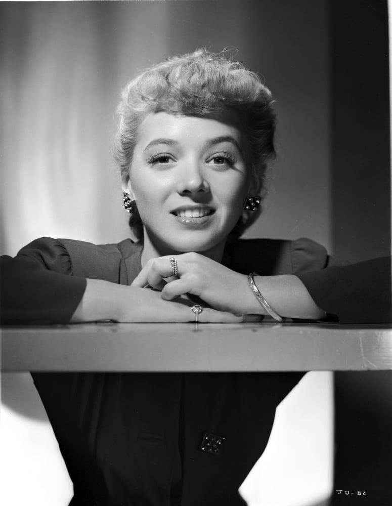Jeff Donnell Portrait in Black Linen Long Sleeve Uniform with Hands ...