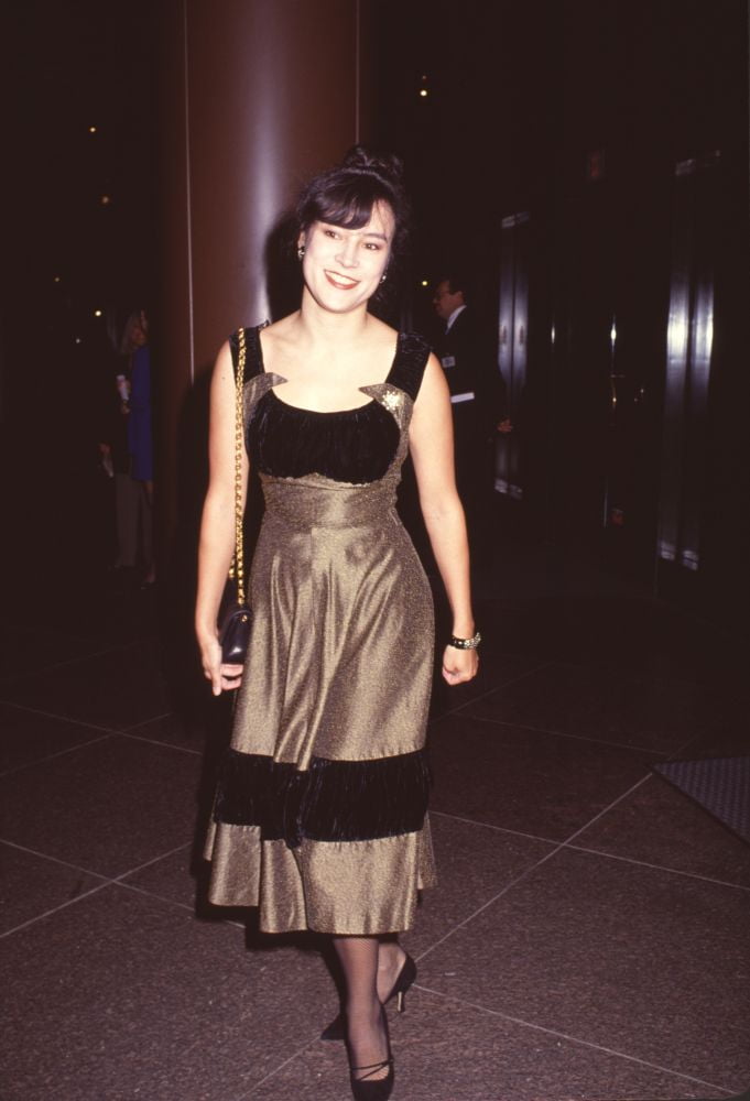Jennifer Tilly In Gold & Black Dress At "Incident At Oglala" Premiere ...