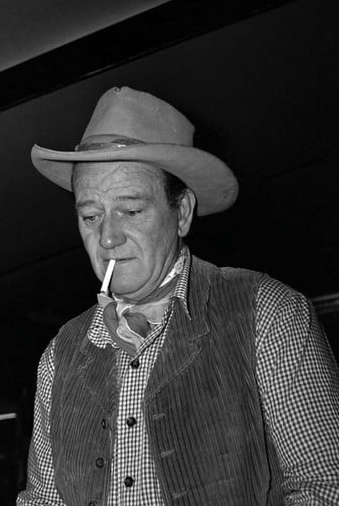 John Wayne in The Comancheros smoking cigarette on film set b/w 24x36 ...