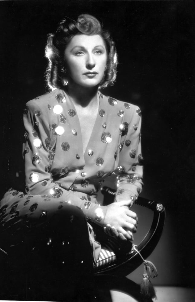 Judith Anderson wearing a Glittering V-Neck Tunic in a Classic Portrait ...