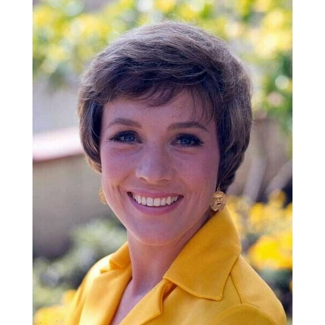 Julie Andrews 1960's smiling portrait in yellow shirt looking to side ...