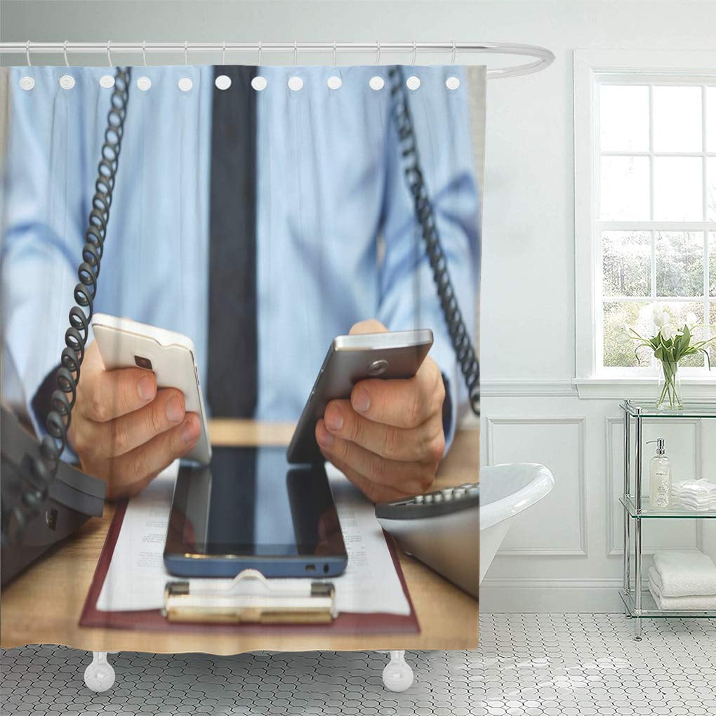 KSADK Ring Busy Businessman in Office at The Desk Using Two Mobile ...