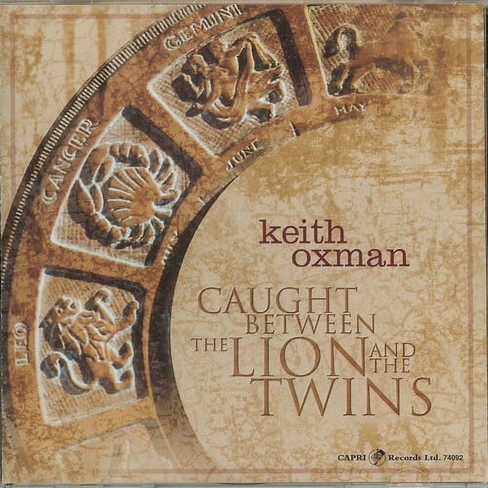 Keith Oxman - Caught Between The Lion and The Twins - Music ...
