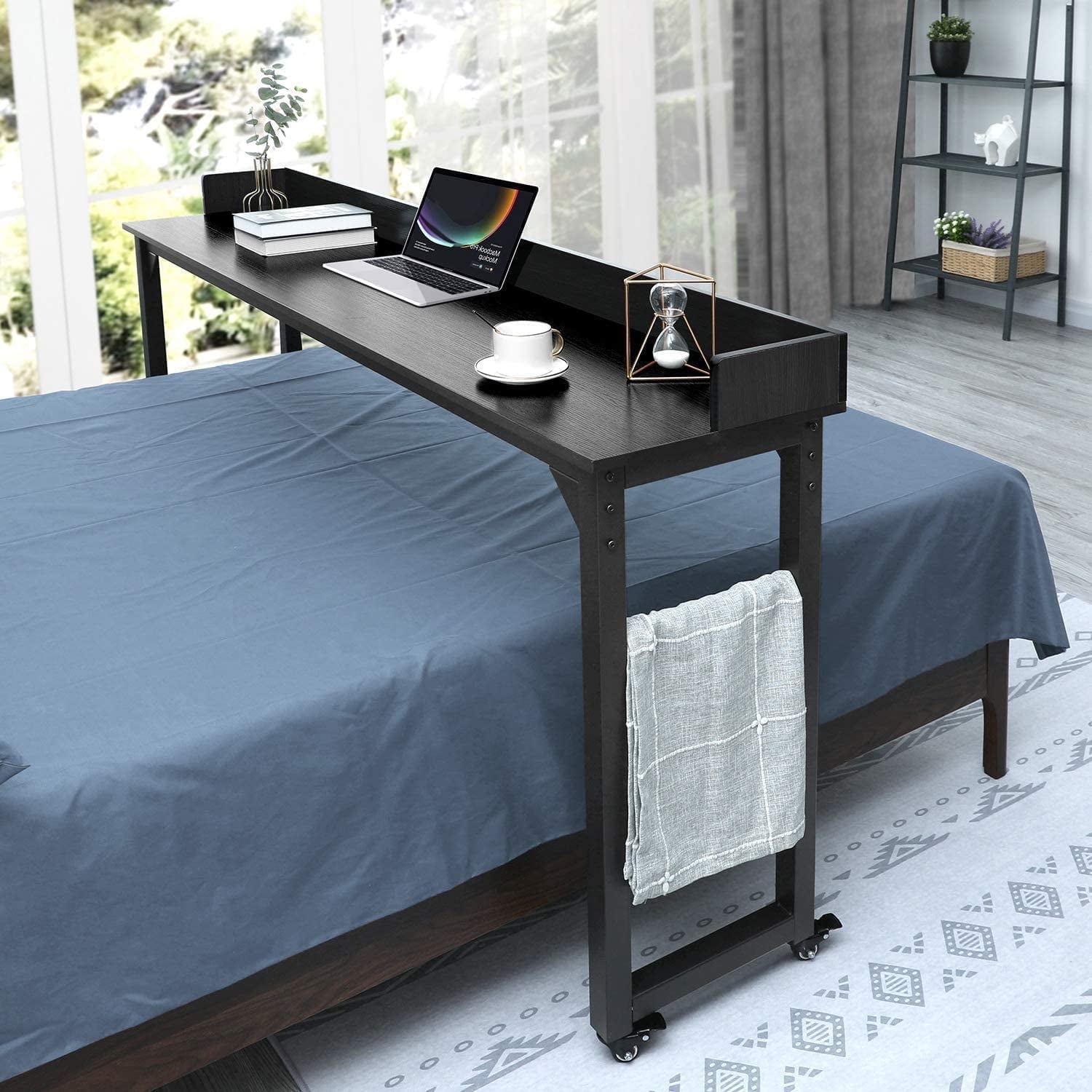 Rolling table over bed store