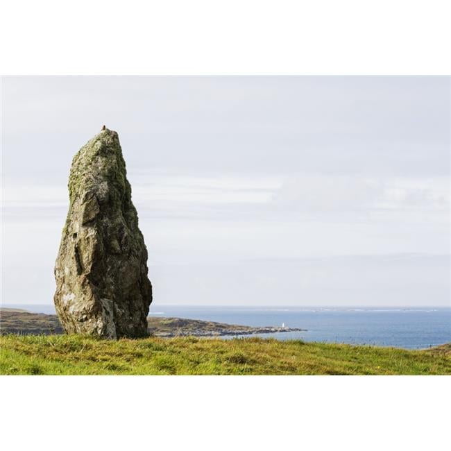 Large Megalithic Rock in Grassy Field Overlooking Bay with Hazy Blue ...