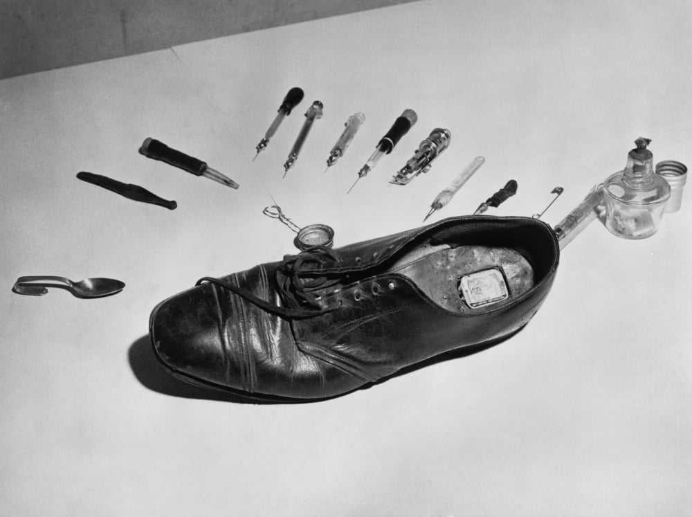 Law Enforcement Photo Of A Shoe With Metal Box In Cut Out Section Of ...