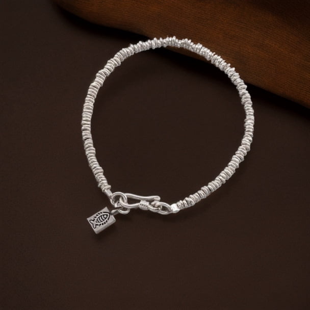 Leander's 999 sterling silver handmade fishbone bracelet, a vintage ...