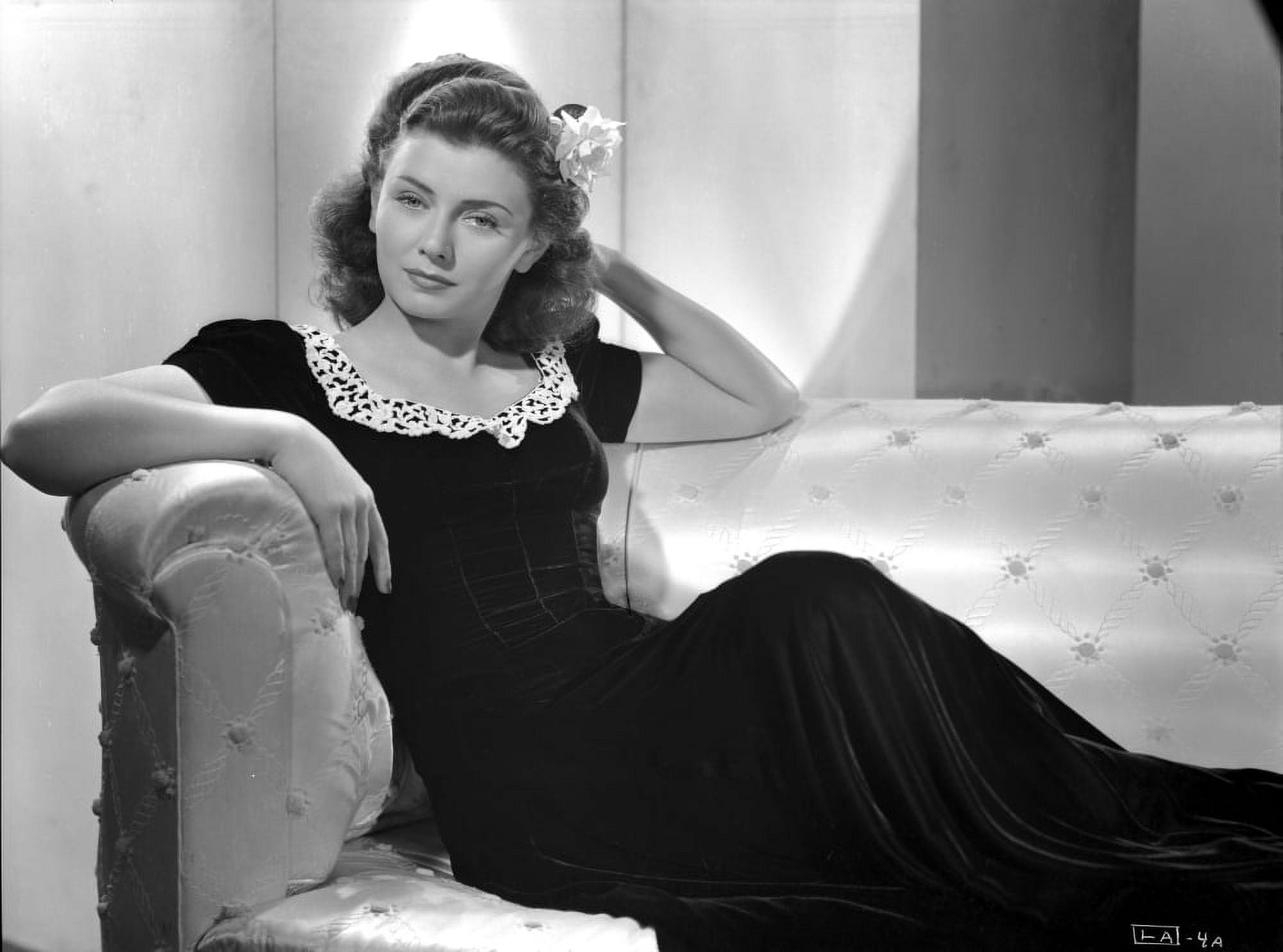 Lenore Aubert on a Dress sitting on a Couch Photo Print (24 x 30 ...