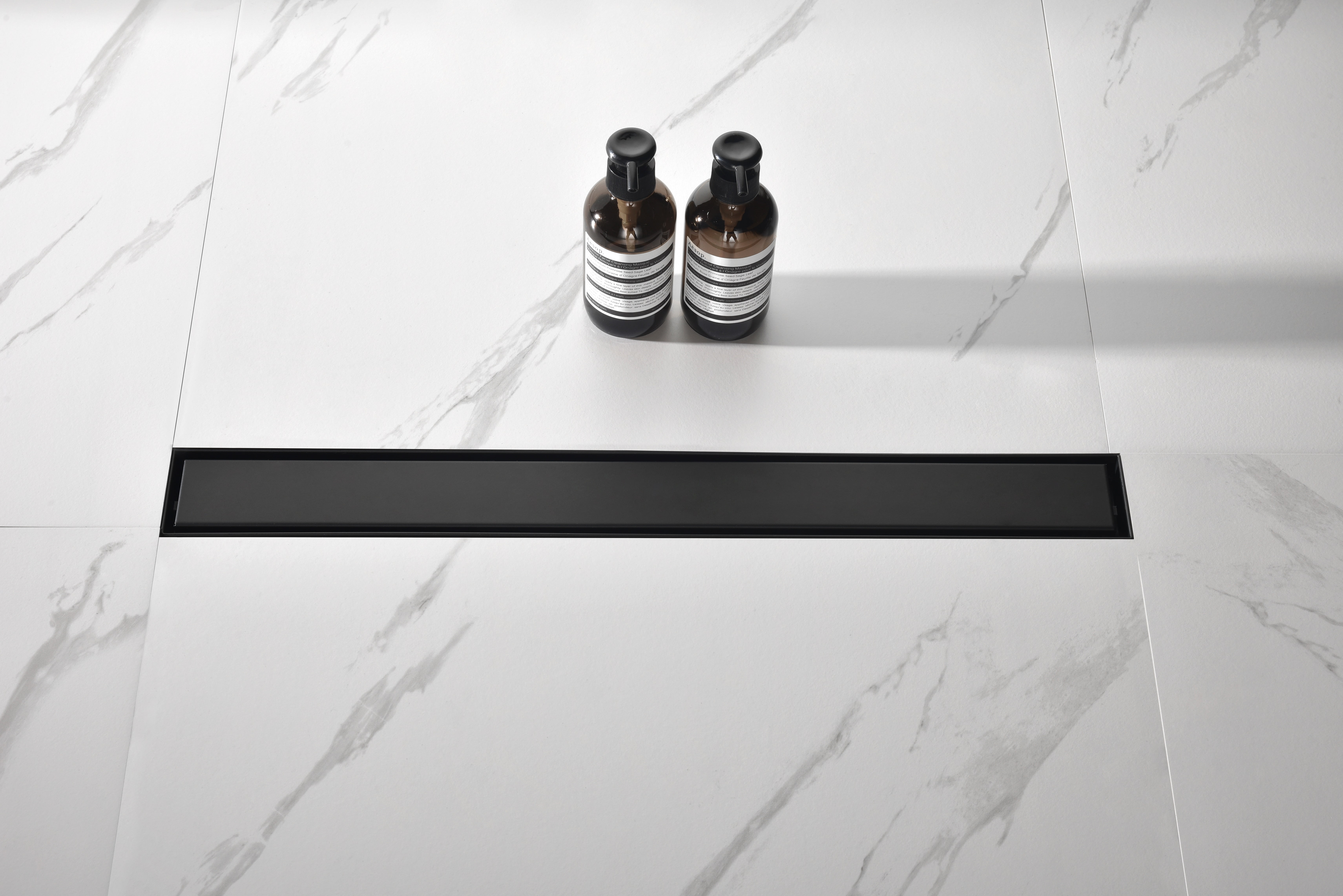Linear Shower Drain With Removable Quadrato Pattern Grate 304