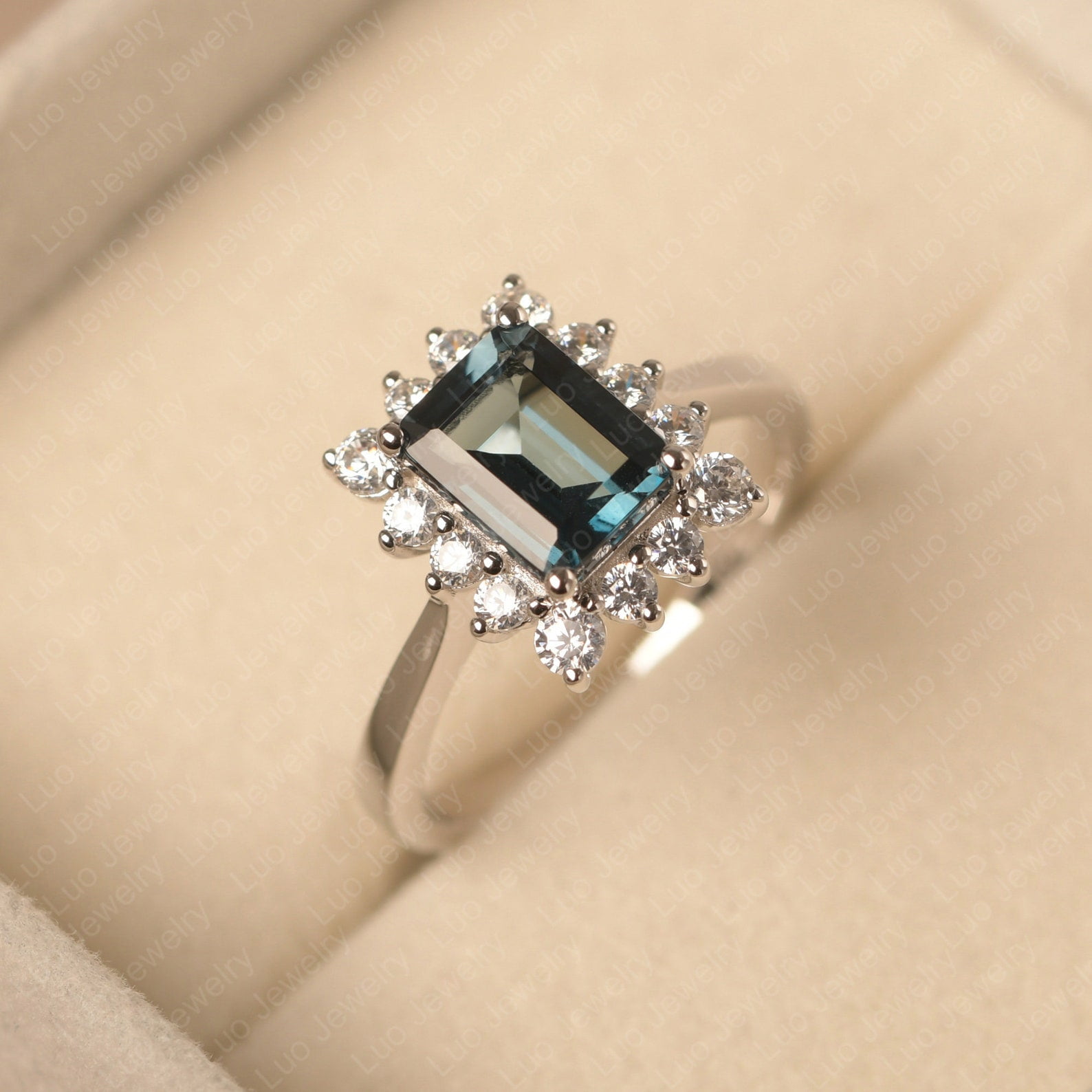 London blue topaz cocktail ring, emerald cut, white gold, halo ring ...