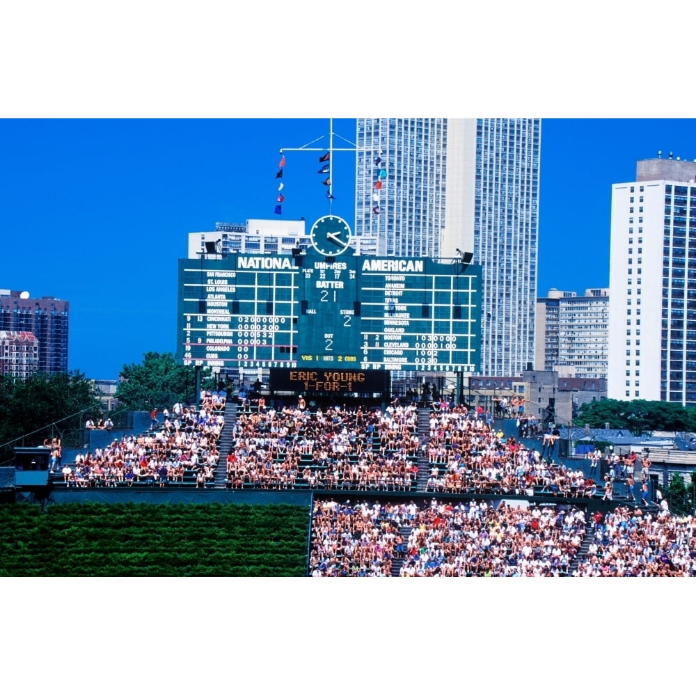 Long view of scoreboard and full bleachers during a professional ...