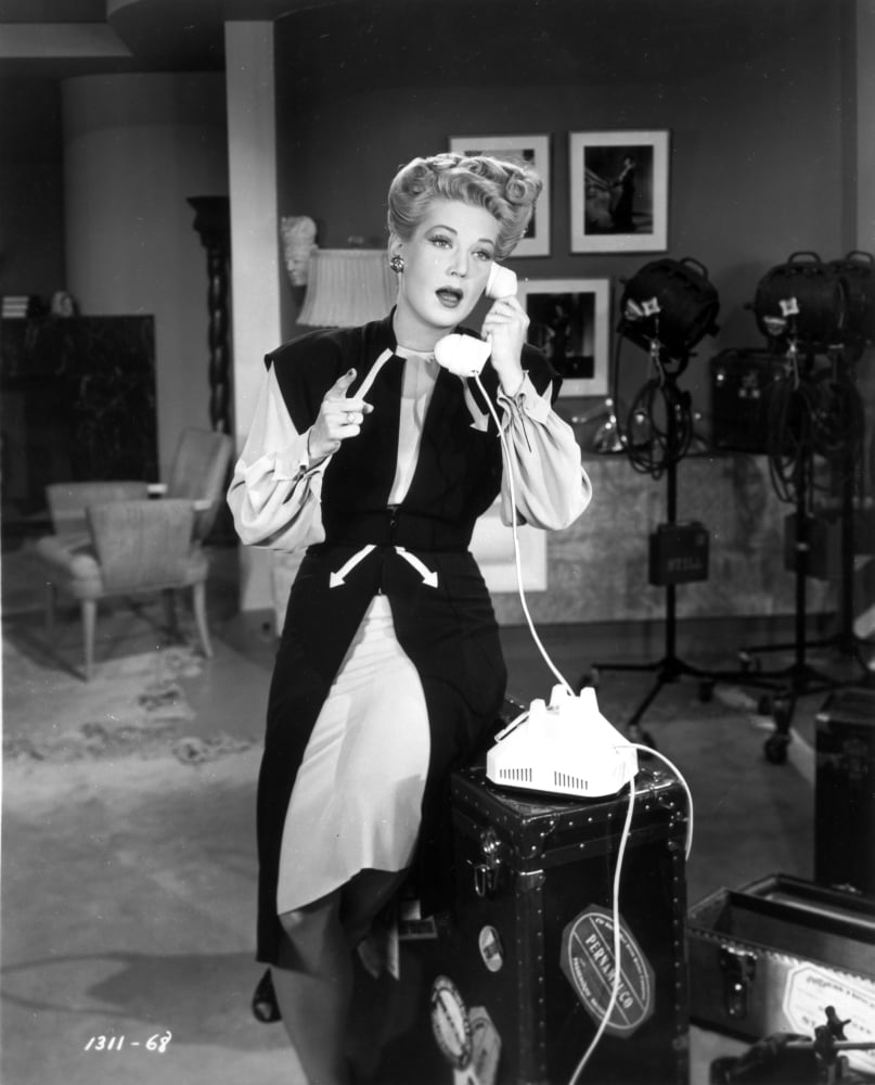 Louise Allbritton talking on a telephone Photo Print (24 x 30 ...