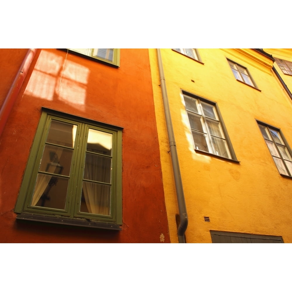 Low Angle View Of Red And Yellow Painted Buildings; Stockholm, Sweden ...
