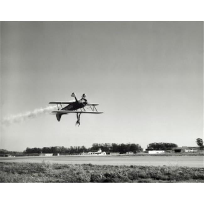 Low Angle View of an Aircraft Upside Down in Flight with Wing Walker ...