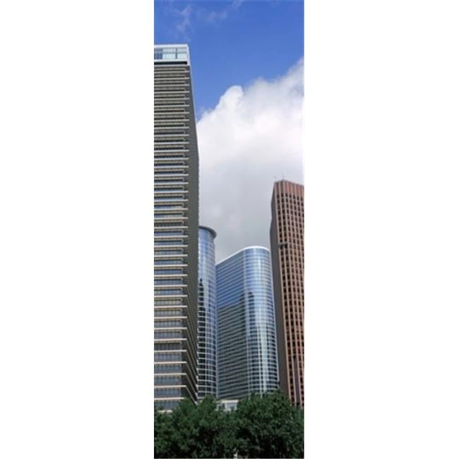 Low angle view of buildings in a city Wedge Tower ExxonMobil Building ...