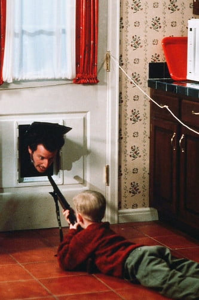 Macaulay Culkin and Daniel Stern in Home Alone firing bibi gun 24x36 ...