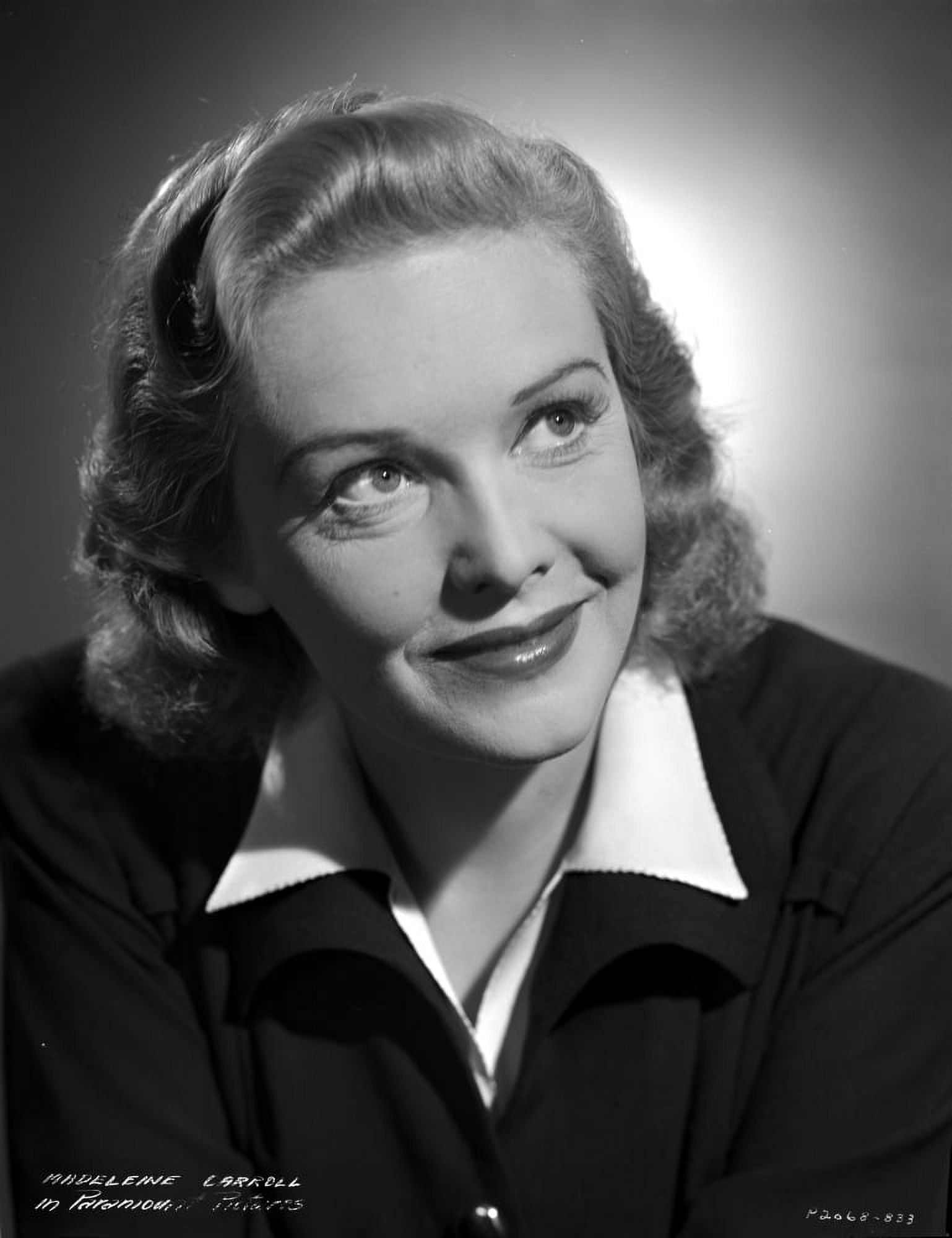 Madeleine Carroll Looking Up in Black Dress with White Collar Photo ...
