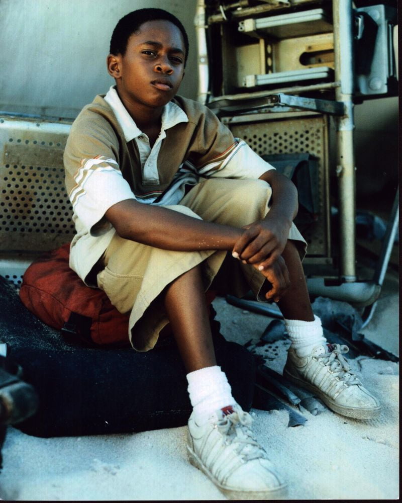 Malcolm David Kelley Sitting With Plane Wreckage Photo Print (8 x 10 ...