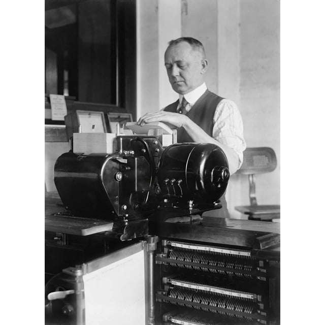Man Loading Punch Cards Into A Tabulating Machine Used In The 1920 ...
