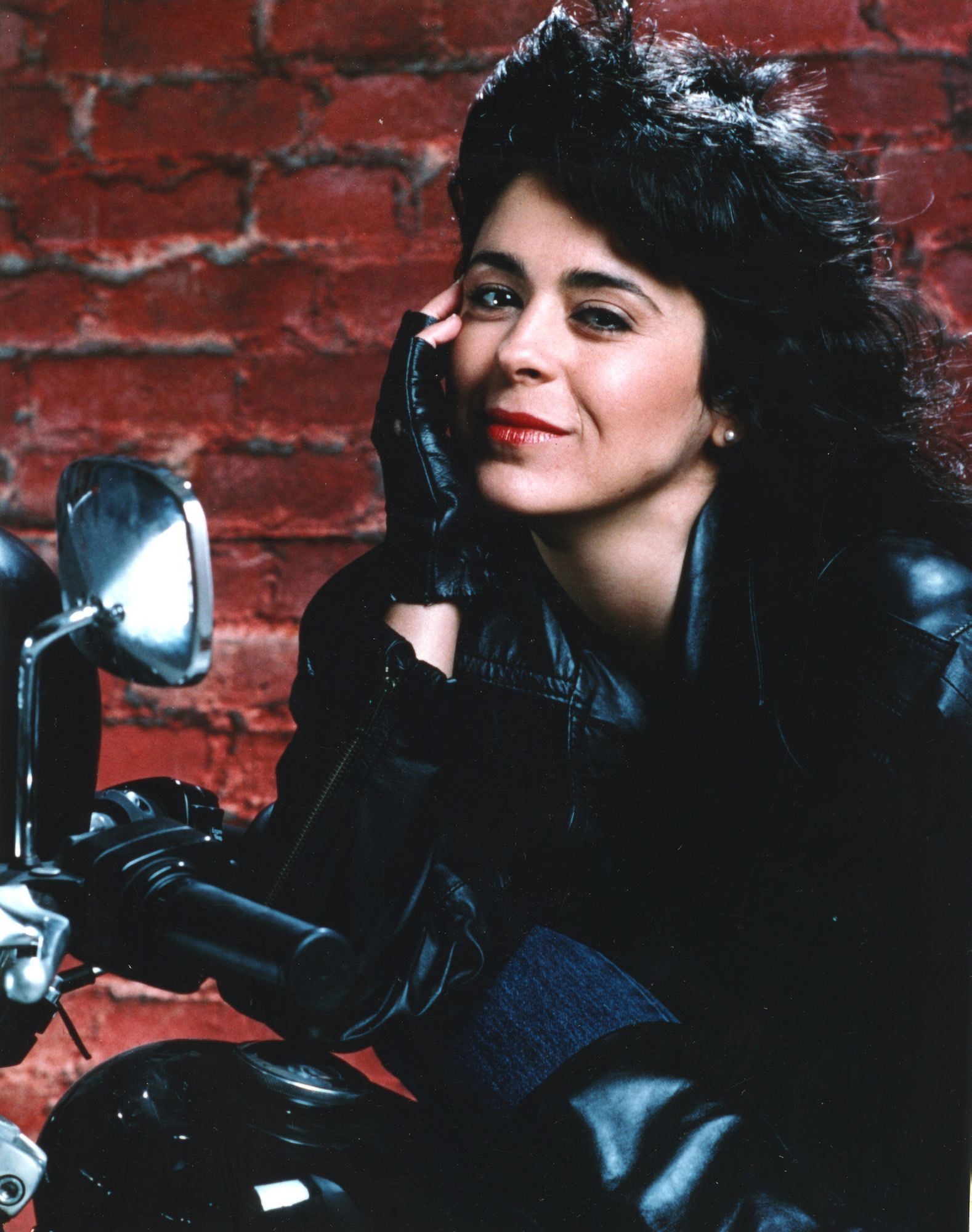 Maria Alonzo Leaning on Motorcycle, wearing Black Leather Jacket with a ...