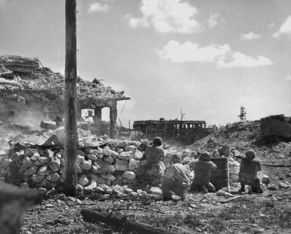 Marines Of The First Division Fire On Japanese Snipers In A Building On ...