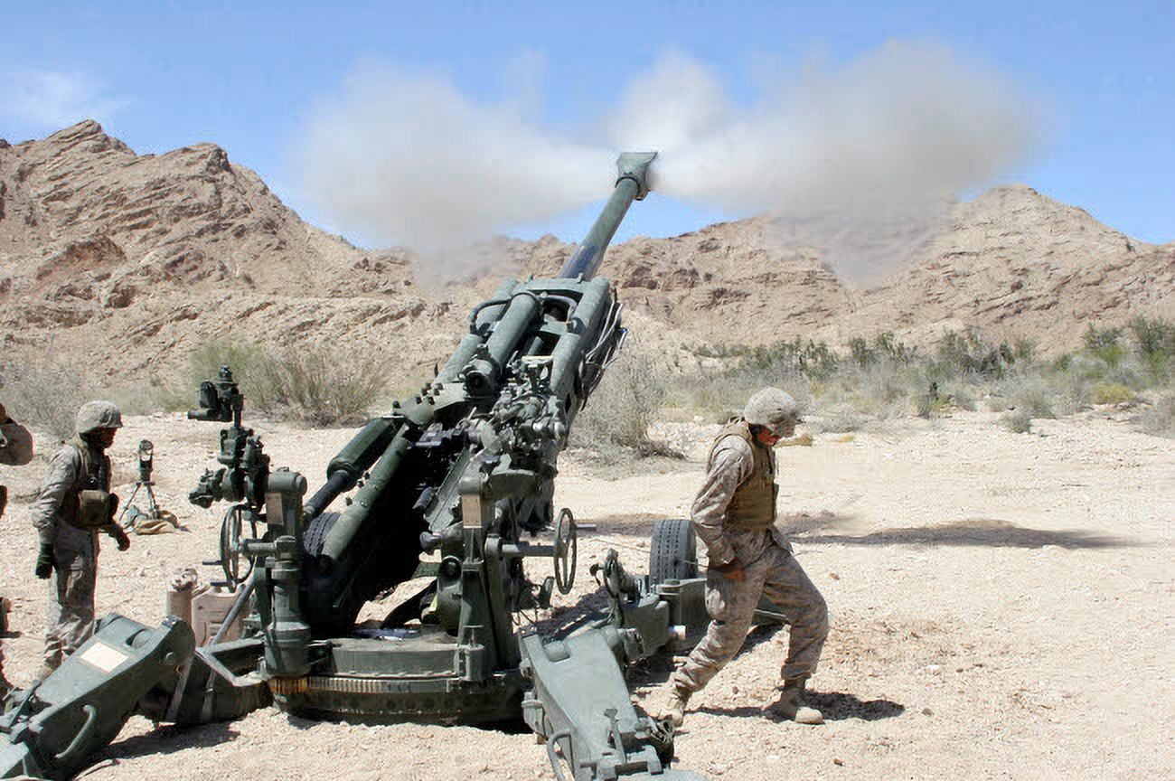 Marines shoot 100-pound rounds from their M777 Lightweight Howitzer ...