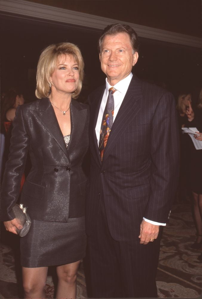 Mary Hart In Black Skirt Suit And Burt Sugarman In Navy Pinstripe Suit ...