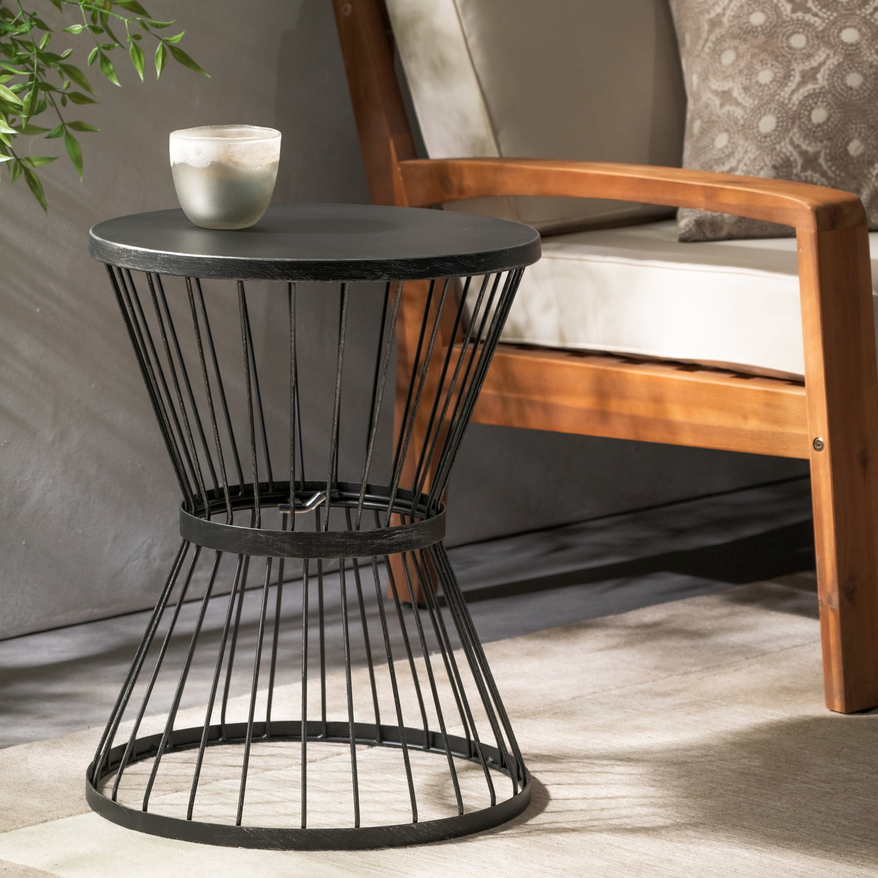 Matte black iron side table with modern hourglass shape / Provide a ...