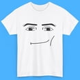 May include White tshirt with a black line drawing of a face with a ...