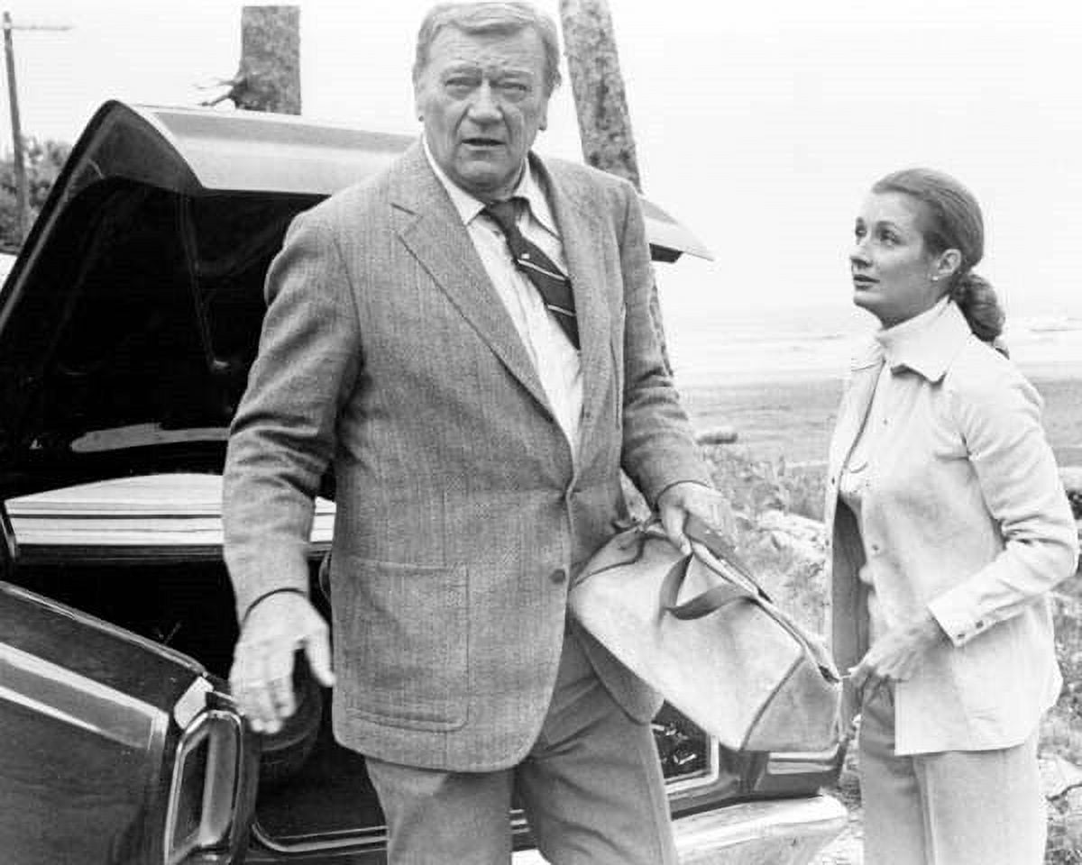 McQ 1974 John Wayne & Diana Muldaur in scene by beach 8x10 inch photo ...